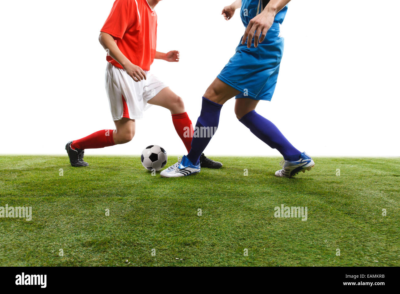 Two football players are playing football Stock Photo - Alamy
