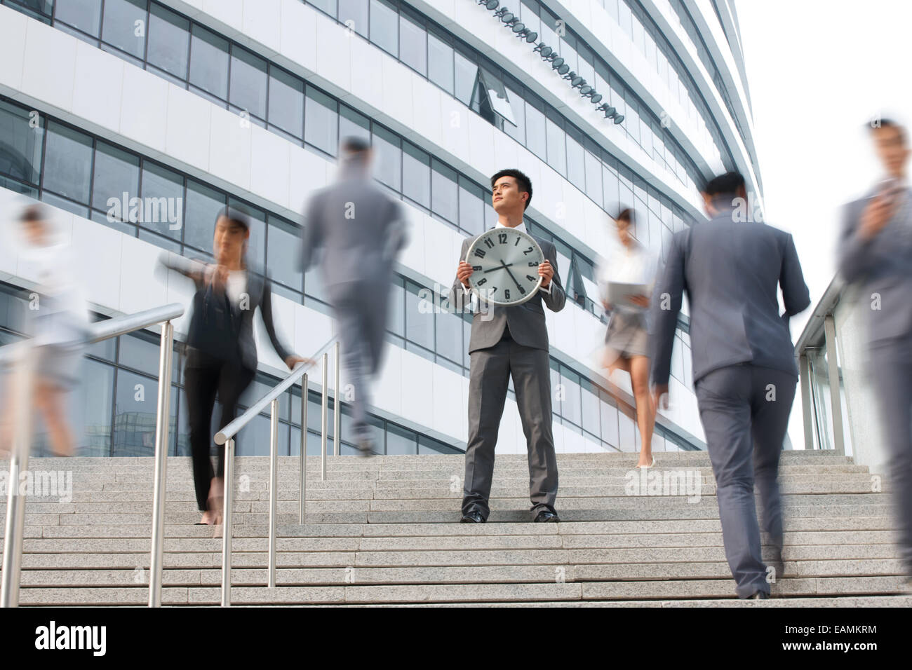 Blurred image of business men in a hurry hi-res stock photography and ...