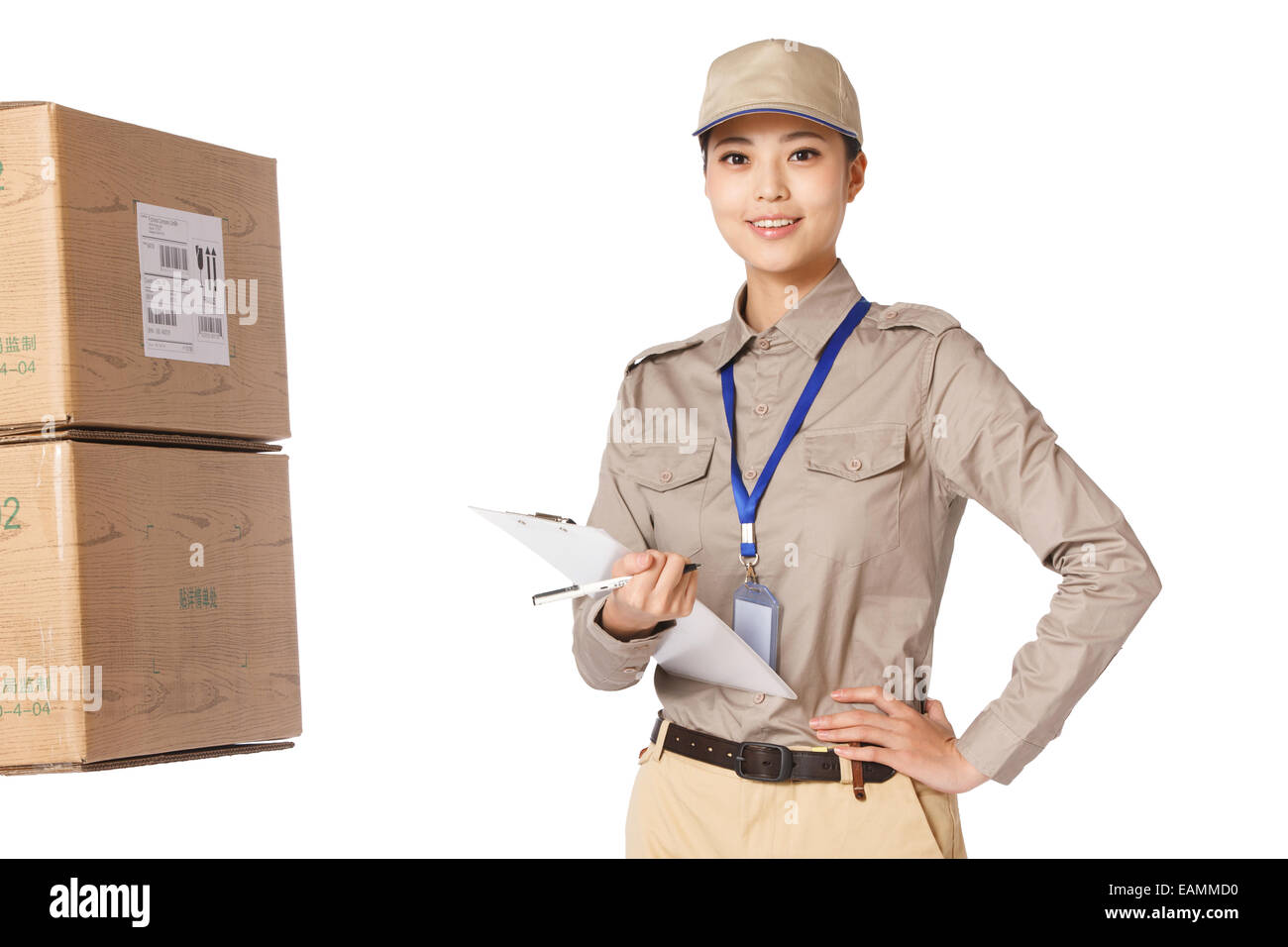 Confident young female logistics personnel Stock Photo - Alamy