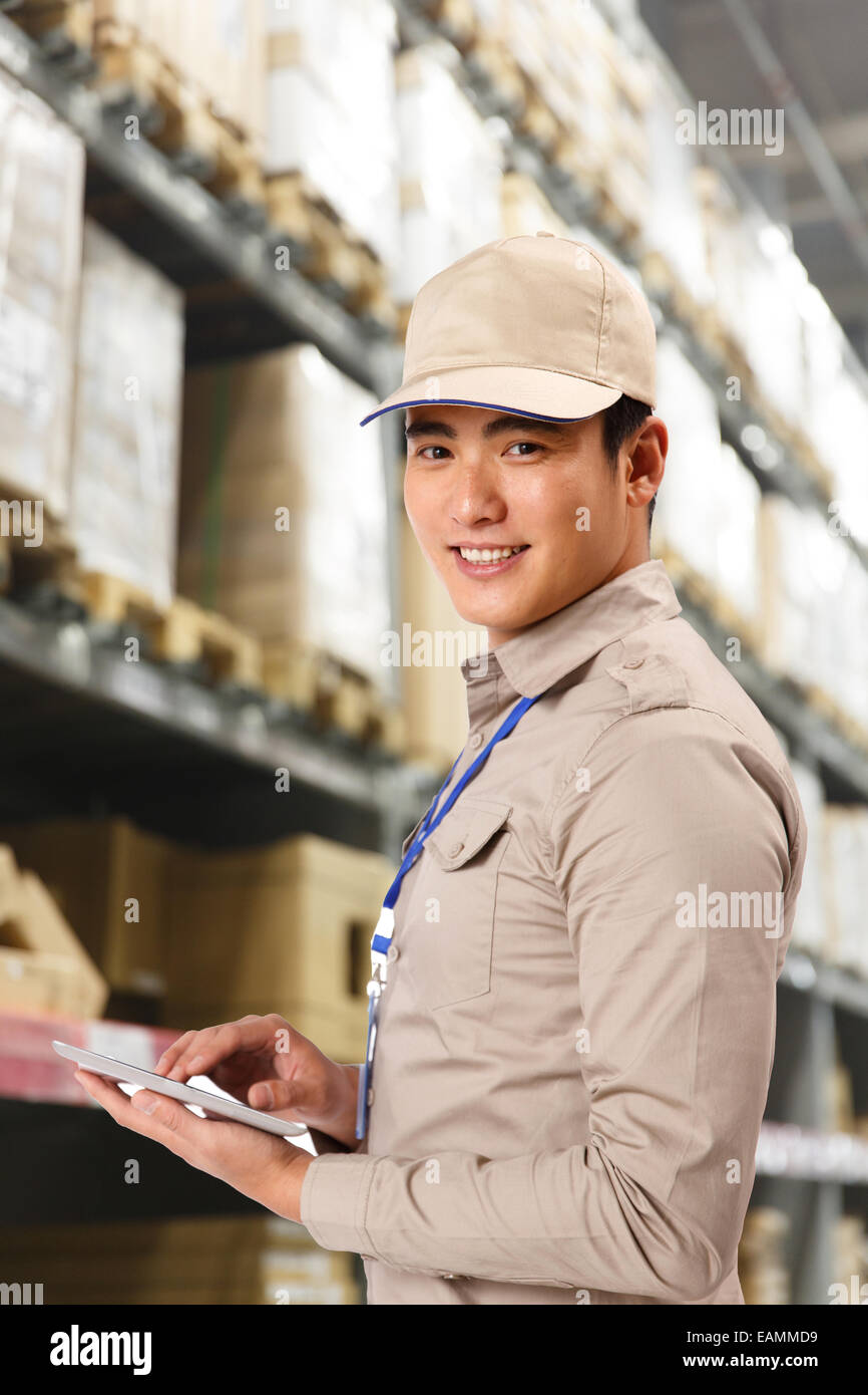 Oriental logistics personnel in the work Stock Photo - Alamy