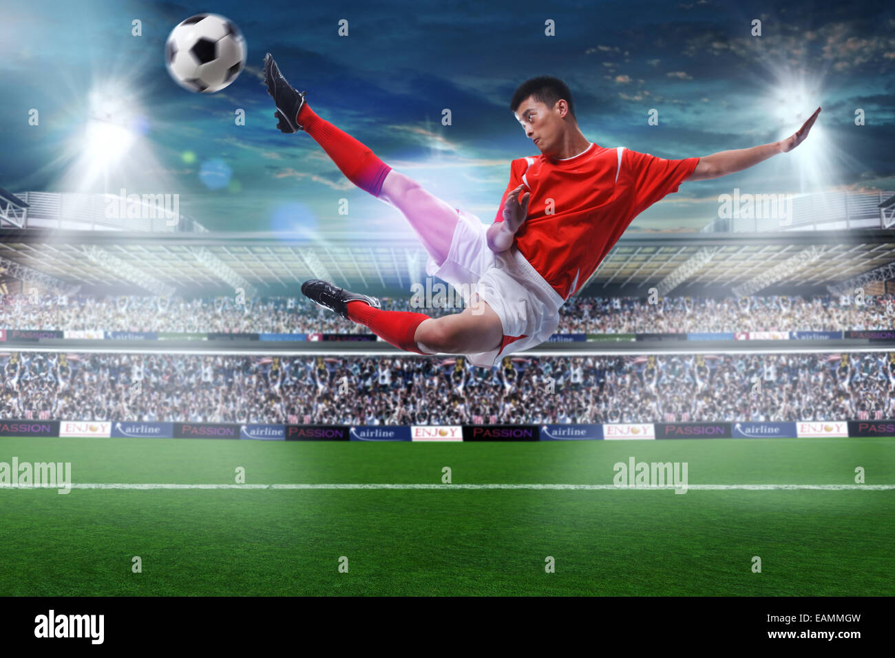 The football player on the sports ground Stock Photo - Alamy