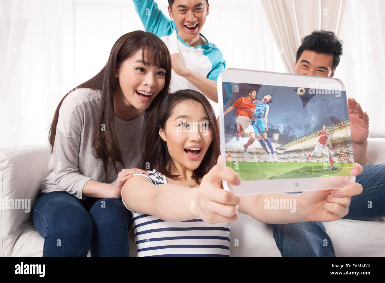 A group of fans are watching football games Stock Photo - Alamy