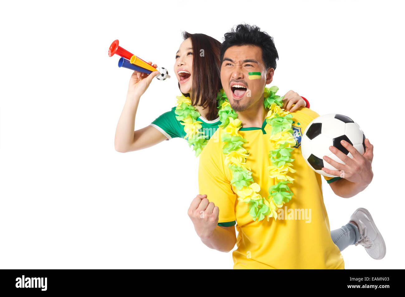 Excited fans couples Stock Photo - Alamy