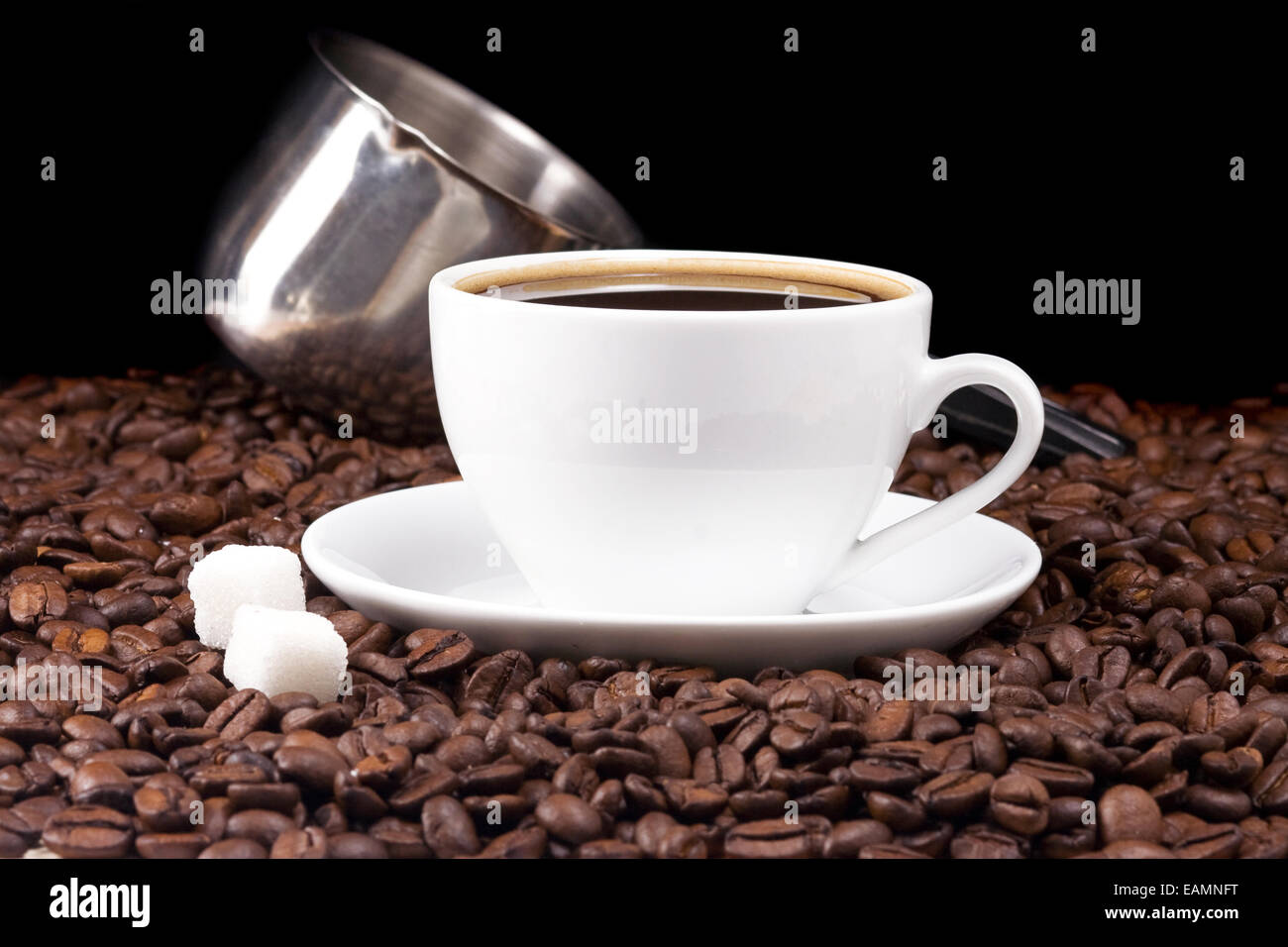 isolated cup and pot on black Stock Photo - Alamy