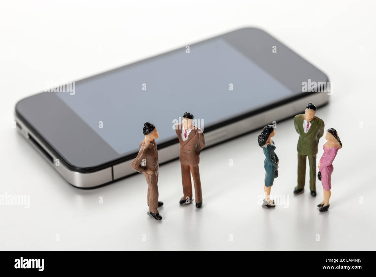 Figurines and mobile phones Stock Photo - Alamy
