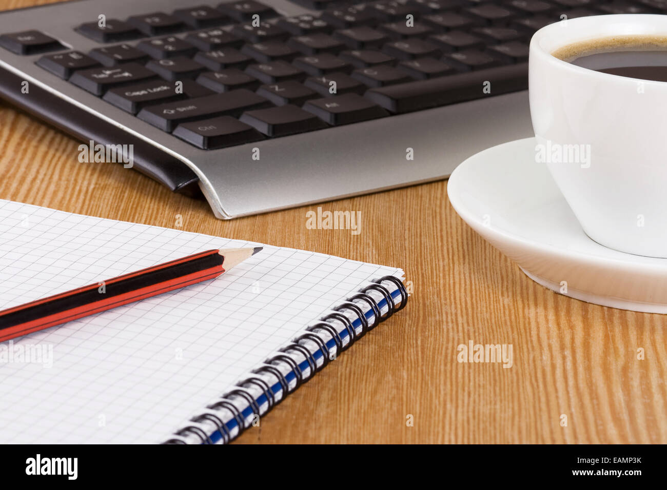 keyboard, pad and coffee on table Stock Photo - Alamy