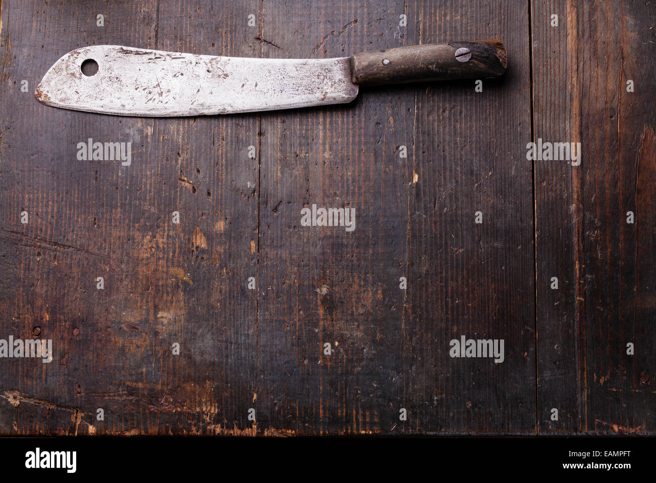 Vintage Meat cleaver on dark wooden background Stock Photo - Alamy