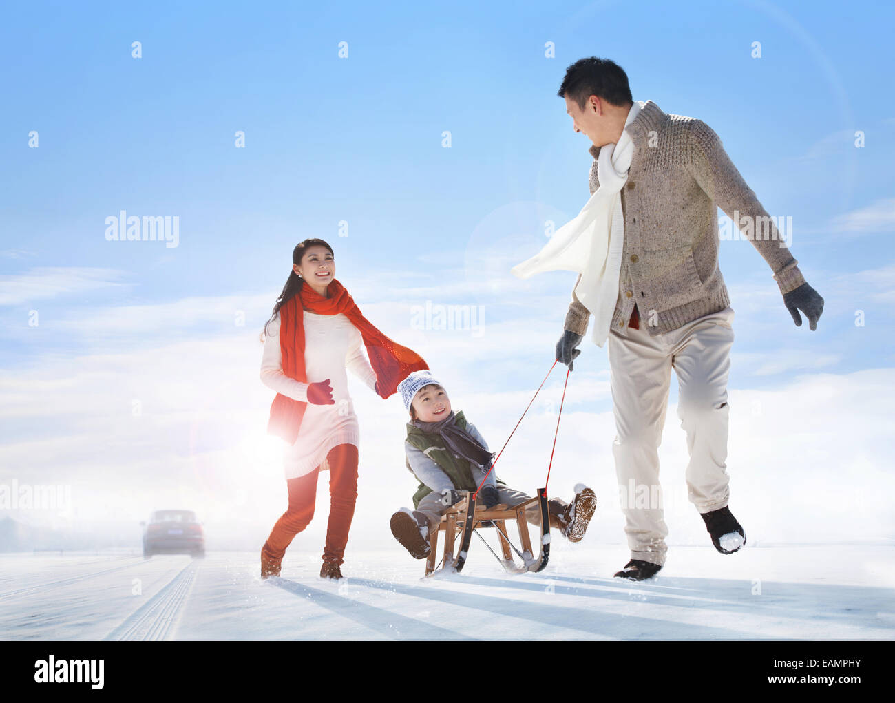 Three young men pulling hi-res stock photography and images - Alamy