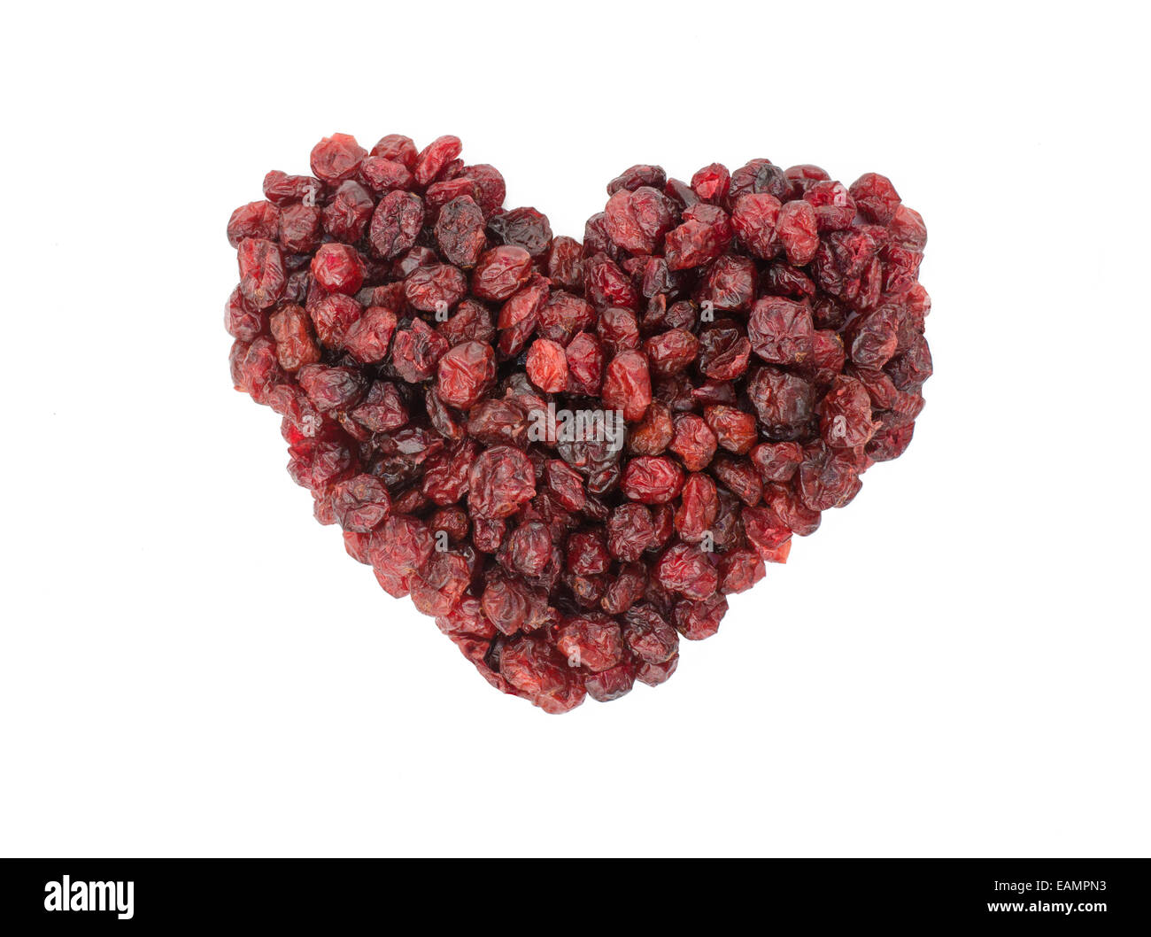 Cranberries in a heart shape isolated on white Stock Photo - Alamy