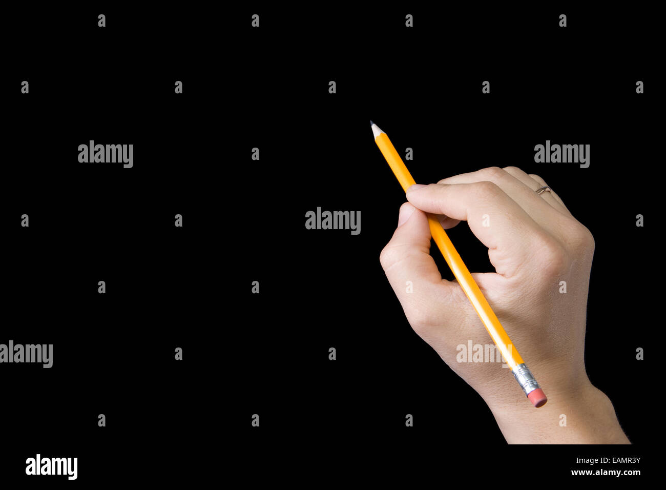 male hand writing by pencil on black background Stock Photo - Alamy