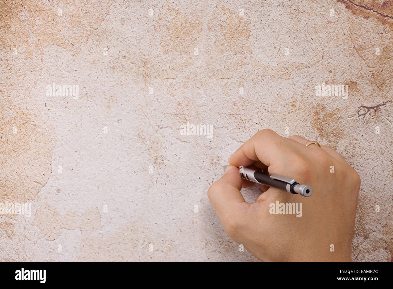 Hand holding feather writing hi-res stock photography and images - Alamy