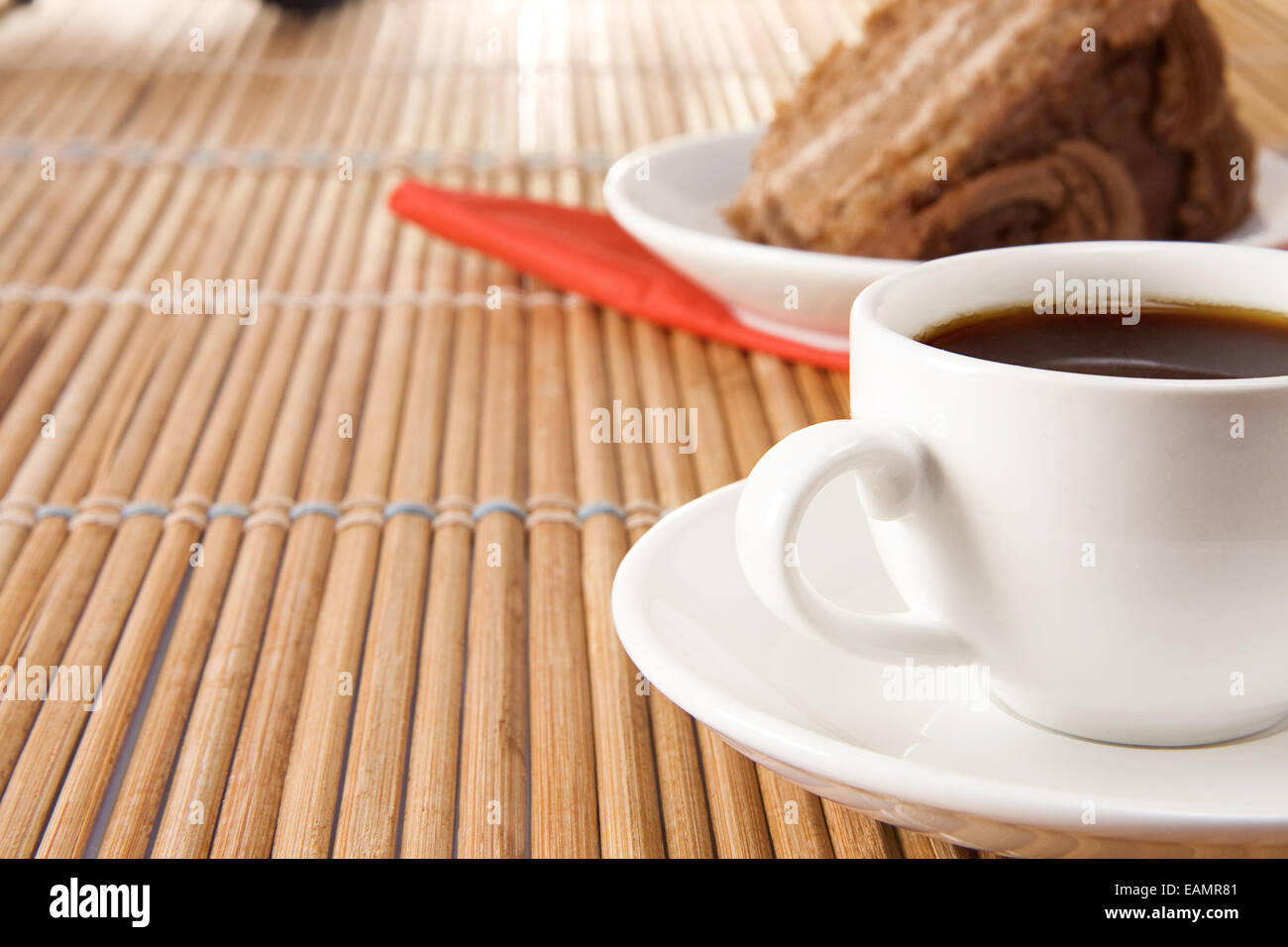 cup of coffee and sweet pie on wood straw table Stock Photo - Alamy