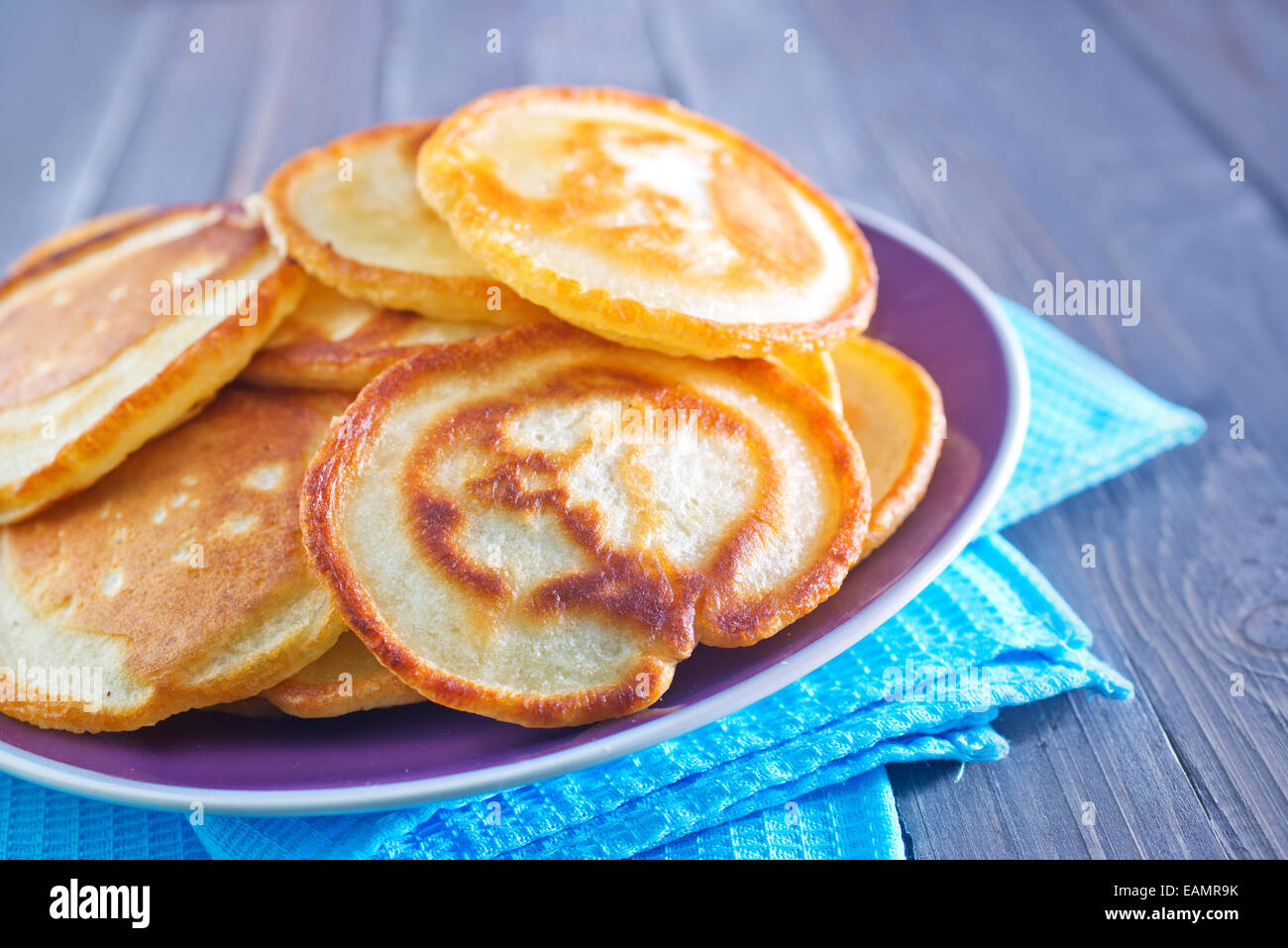 pancakes on the plate and on a table Stock Photo - Alamy