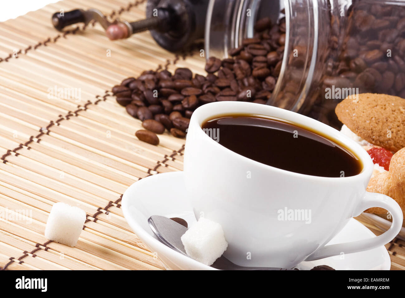 cup of cofee, beans and sweets Stock Photo - Alamy