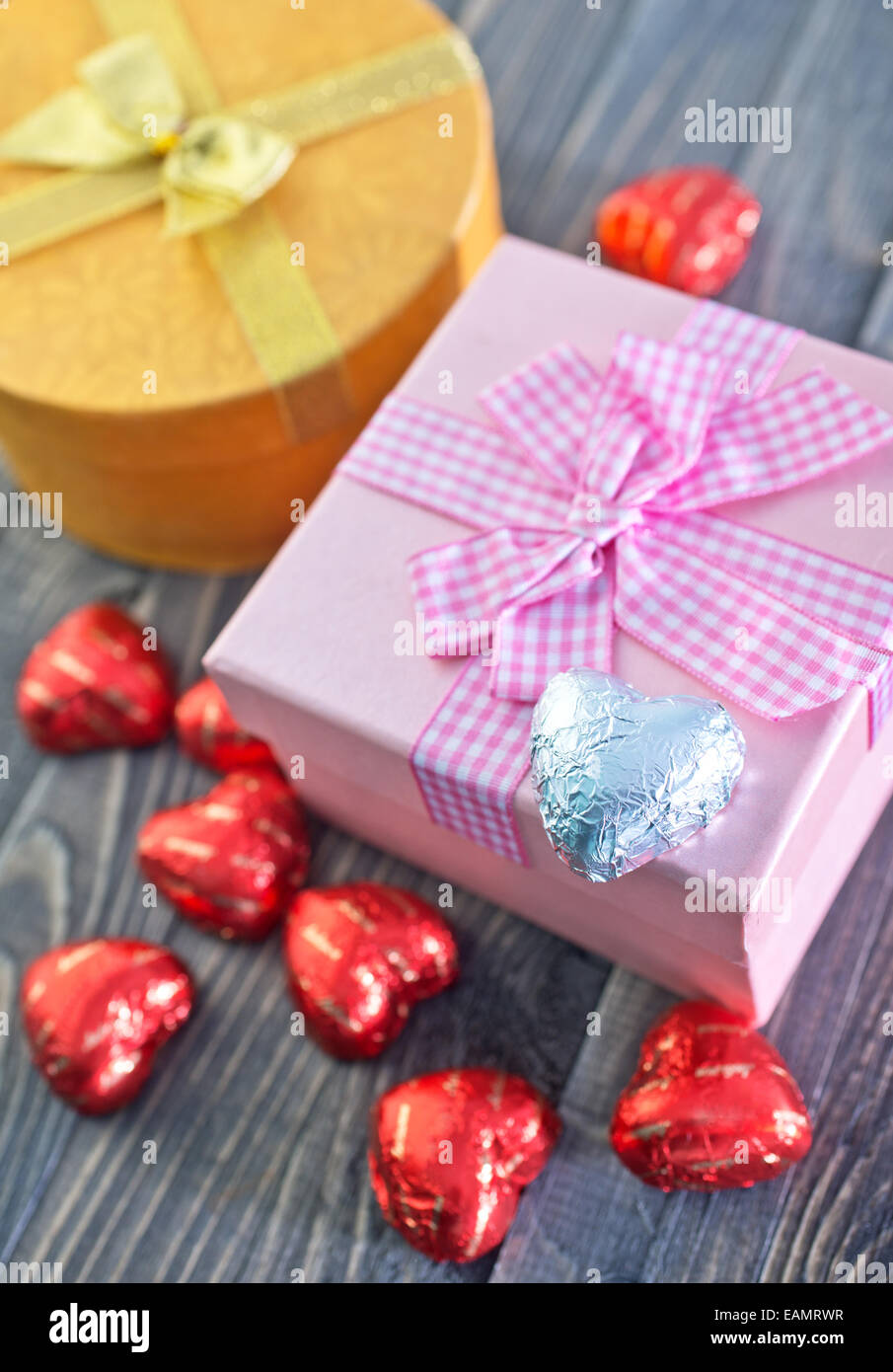 chocolate candy and box for present on a table Stock Photo - Alamy