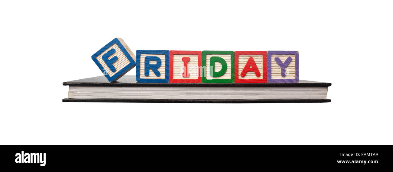 Alphabet blocks forming the word FRIDAY on a book isolated on white ...