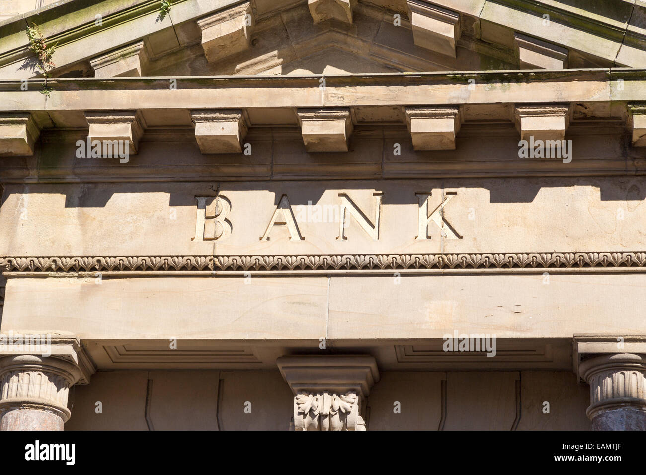UK, Lancaster, Bank sign carved in stone over building entrance Stock ...