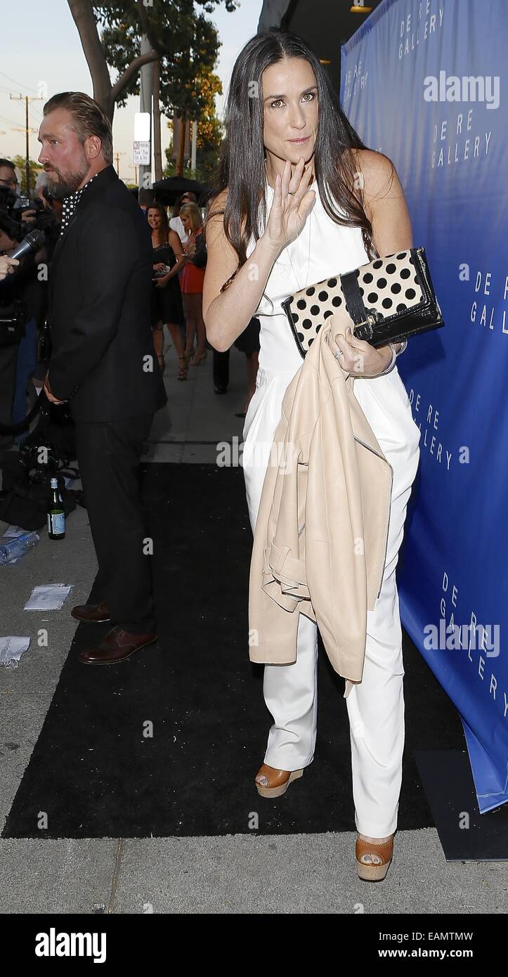 Demi Moore and her friend Brian Bowen Smith arrive at the De Re Art ...