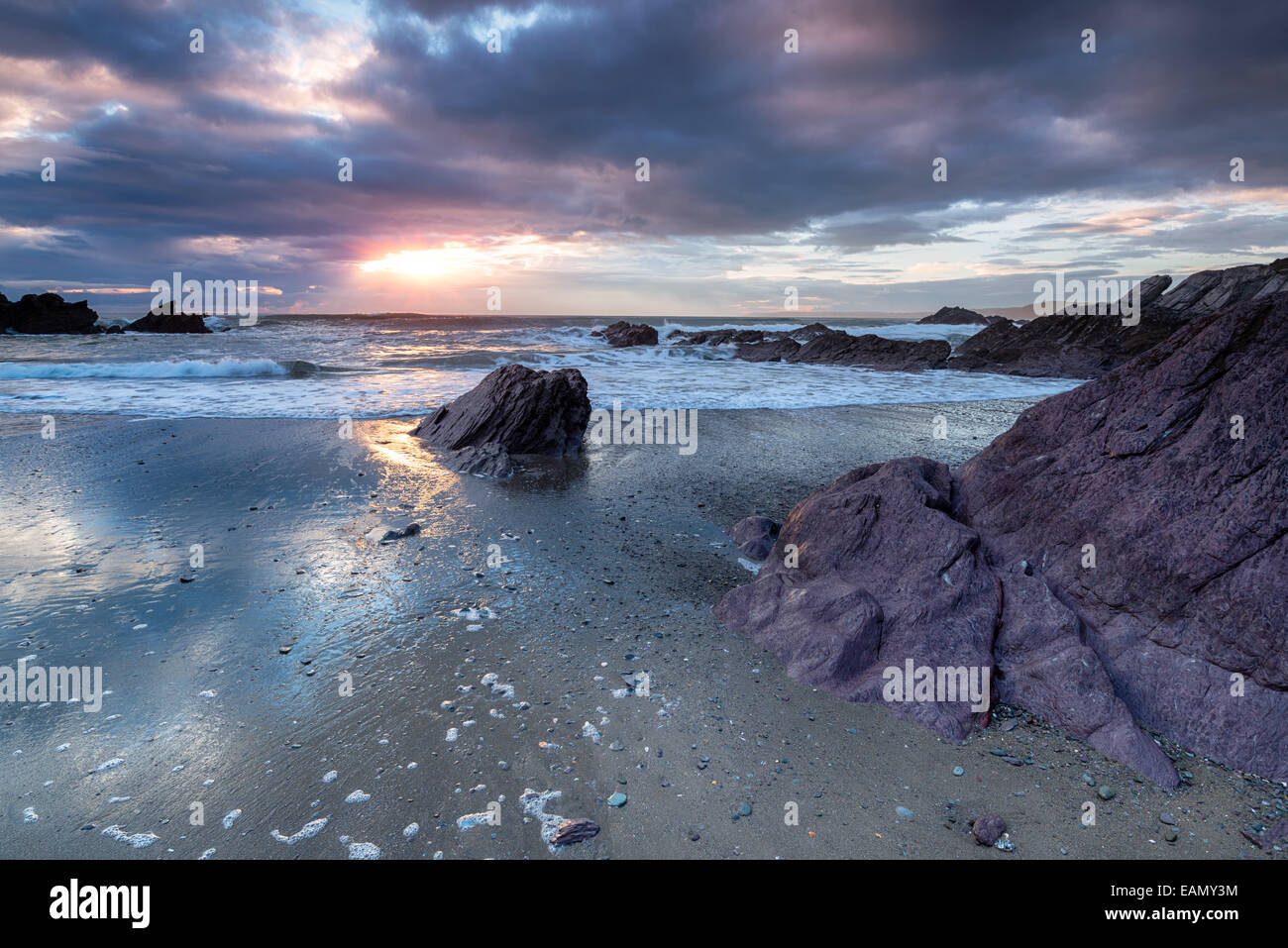 Stormy sunset at Sharrow Beach part of Whitsand Bay at Freathy in east ...