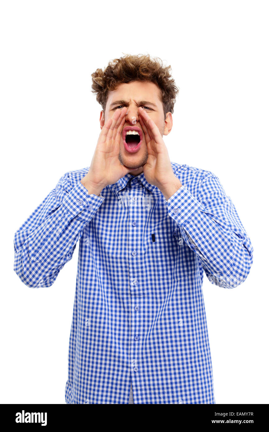 Portrait of a young man screaming over white background Stock Photo - Alamy