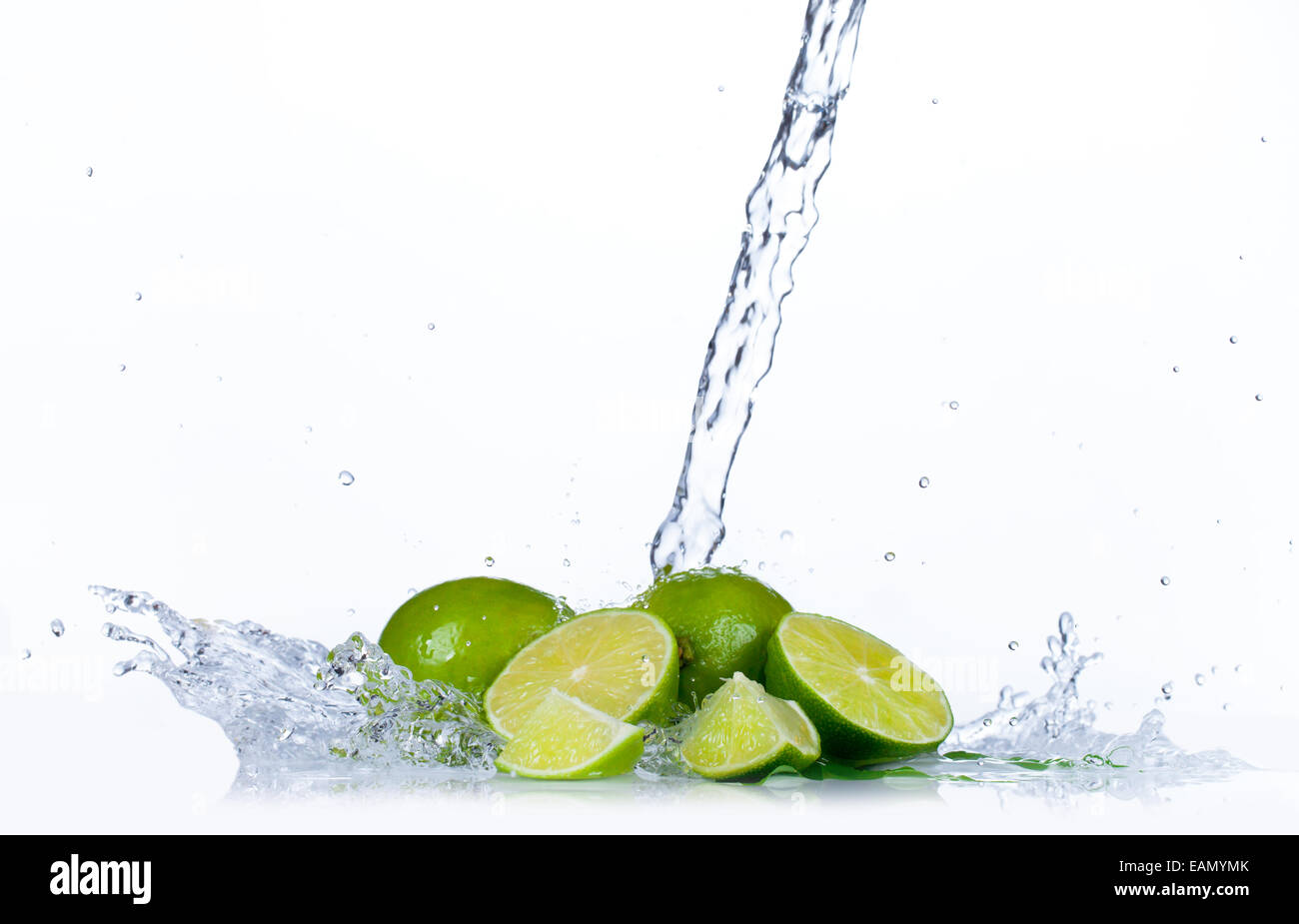Fresh limes with water splash, isolated on white background Stock Photo ...