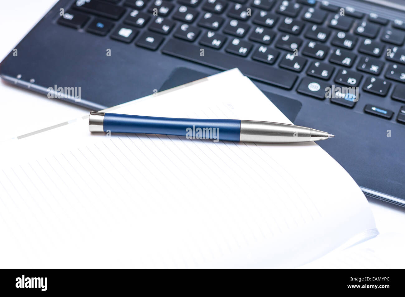 Study: pen, notebook, keyboard Stock Photo - Alamy