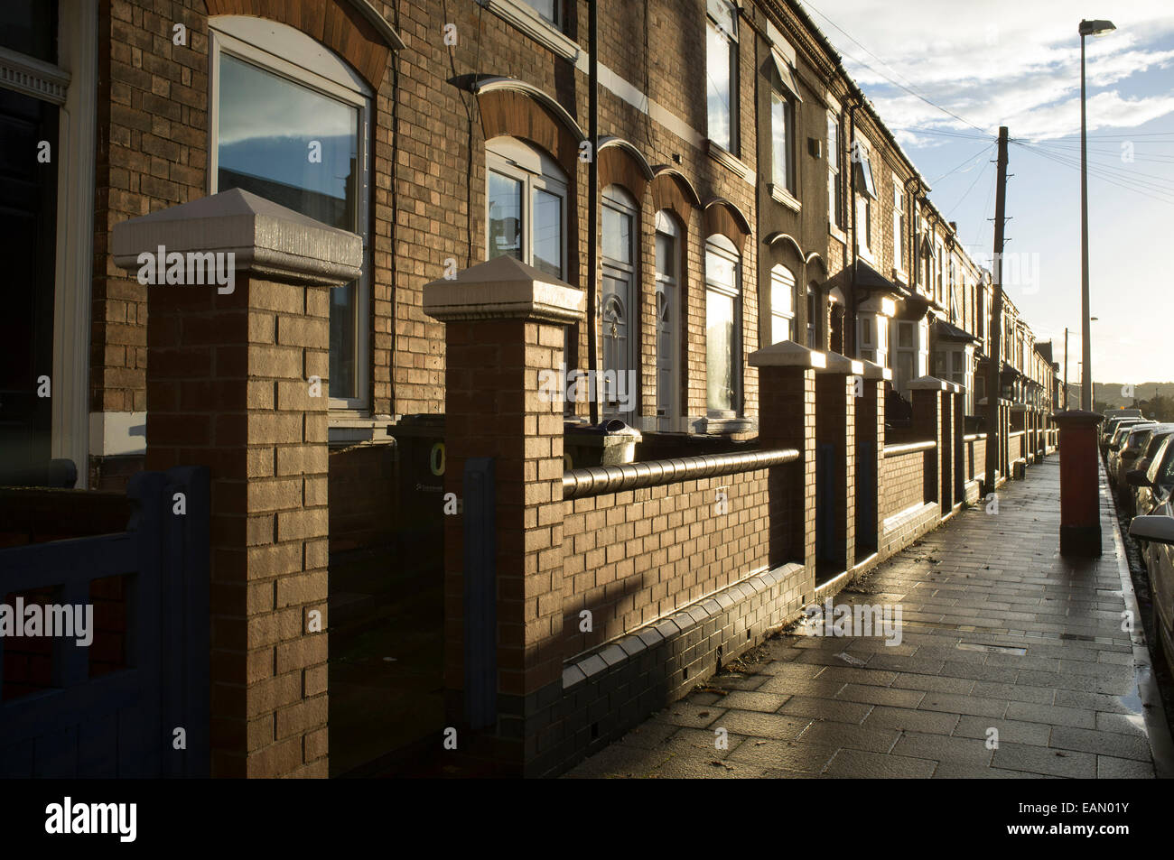 Street of terraced houses, sunshine after rain Stock Photo - Alamy
