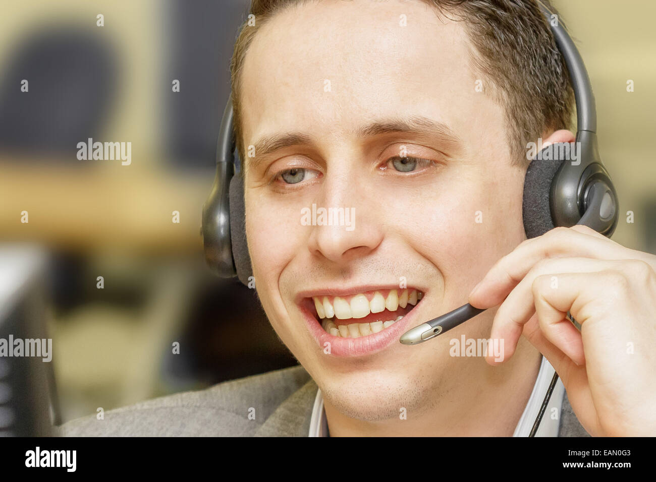 Call Centre - Young 20s man wearing audio headset in telemarketing ...
