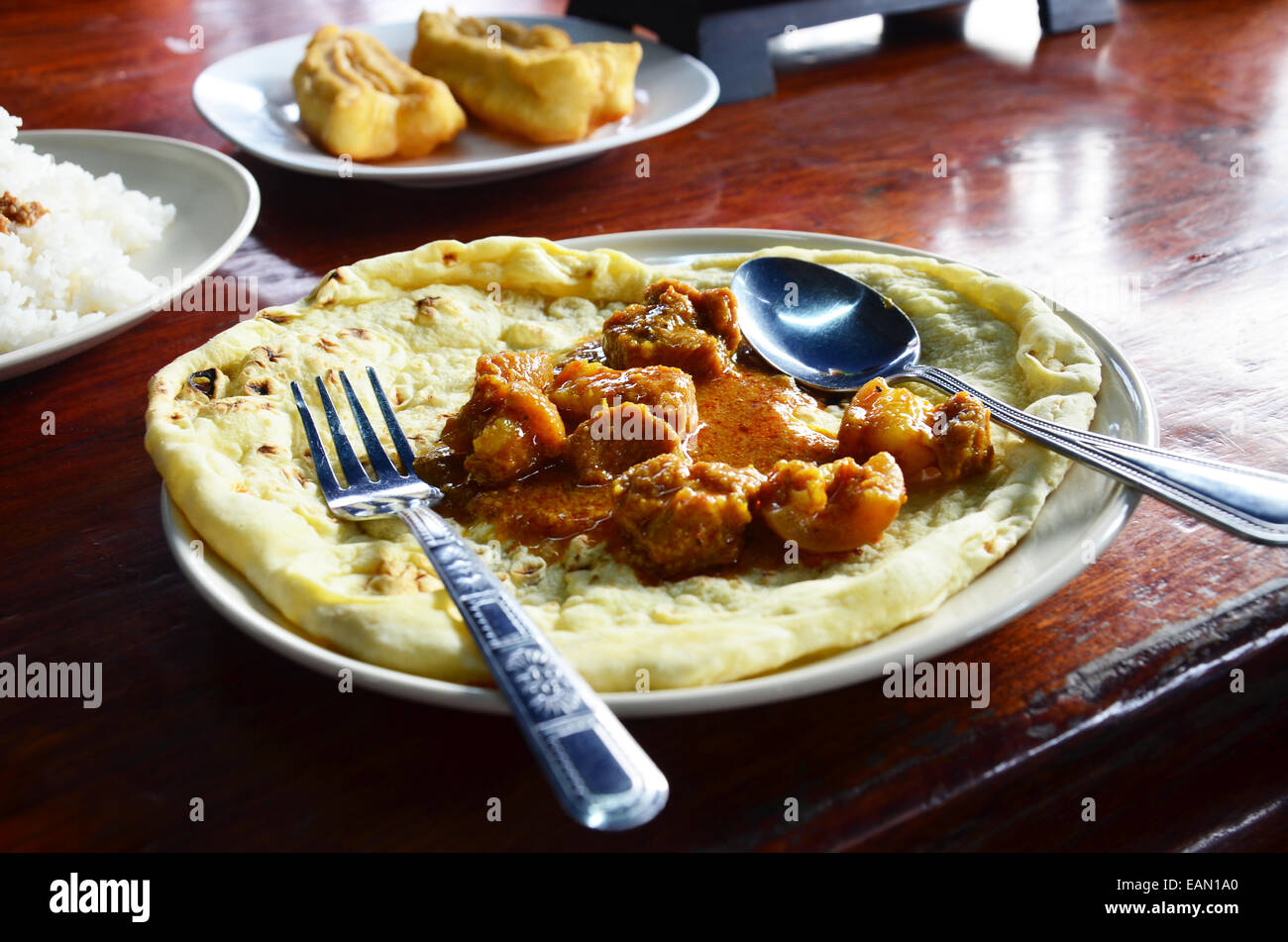 Roti Mataba with Chicken massaman Curry Stock Photo - Alamy