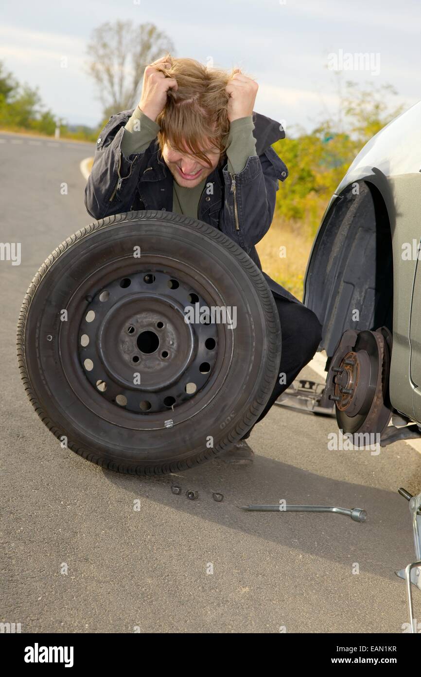 Car tyre change roadside hi-res stock photography and images - Alamy