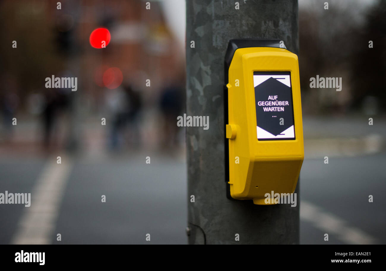 'Wait for counterpart' can be read on a Streetpong traffic light in ...
