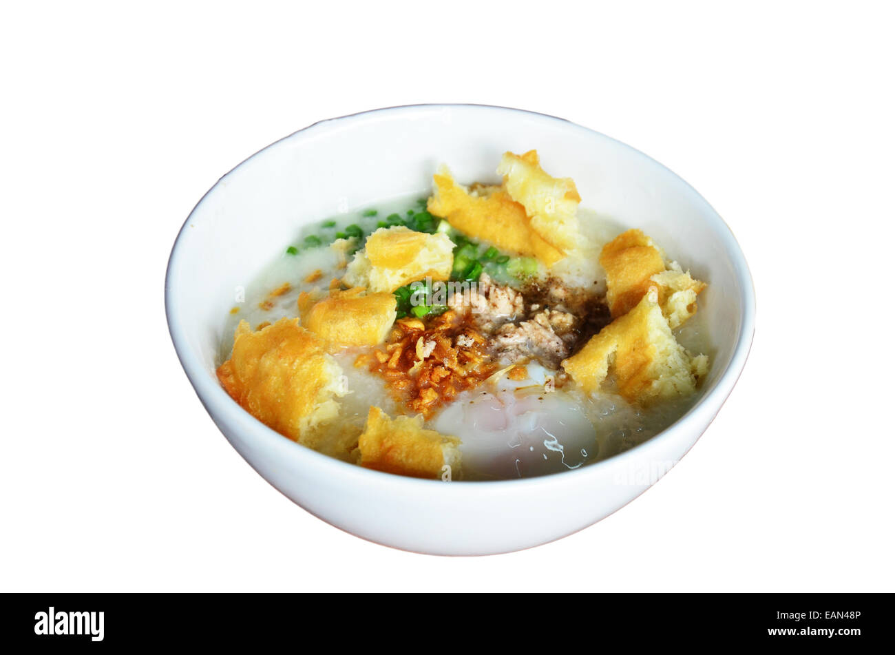 Rice porridge or Congee with white deep-fried doughstick or sugar ...