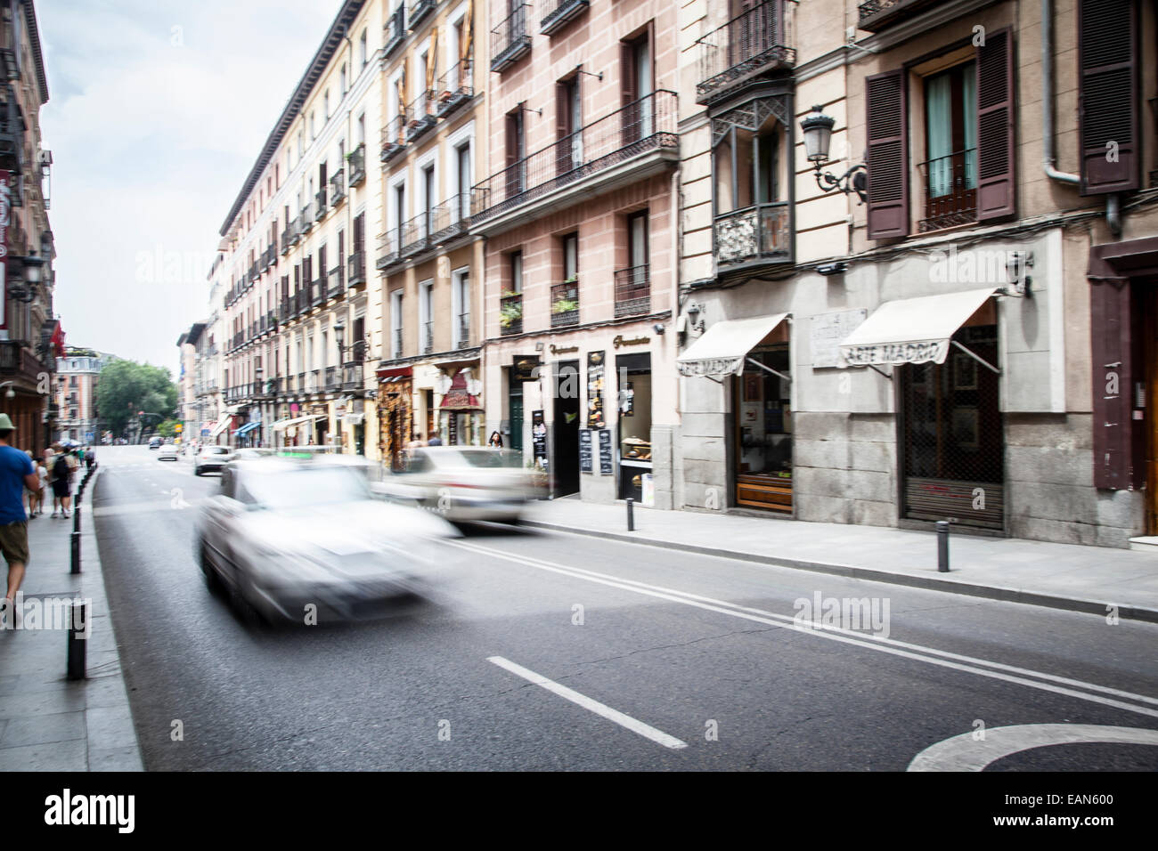 Spanish street with few shop Stock Photo - Alamy