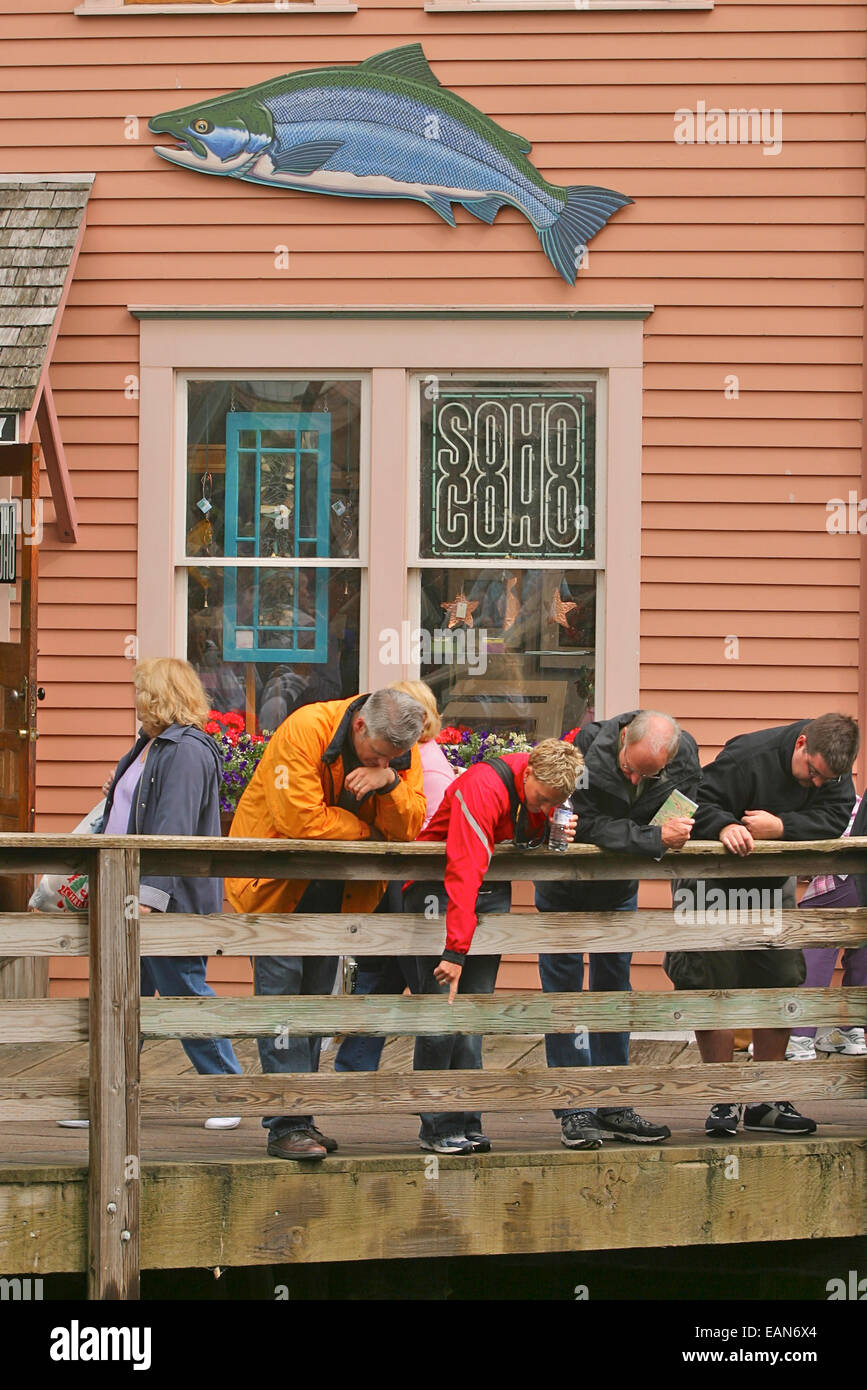 Woman looking down over railing hi-res stock photography and images - Alamy