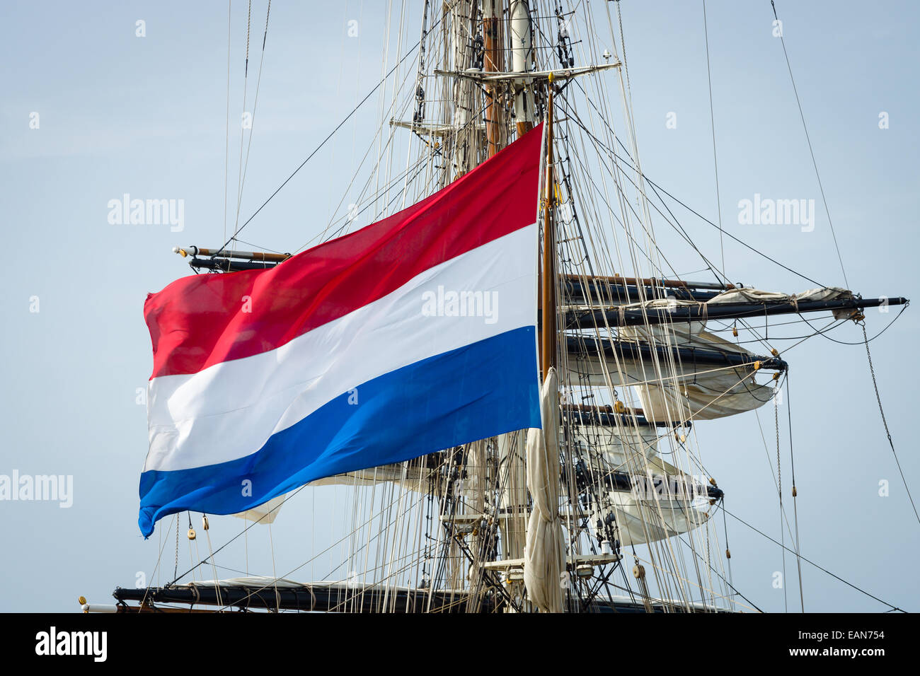Flag of Netherlands against the background of the rigging of sailing ...