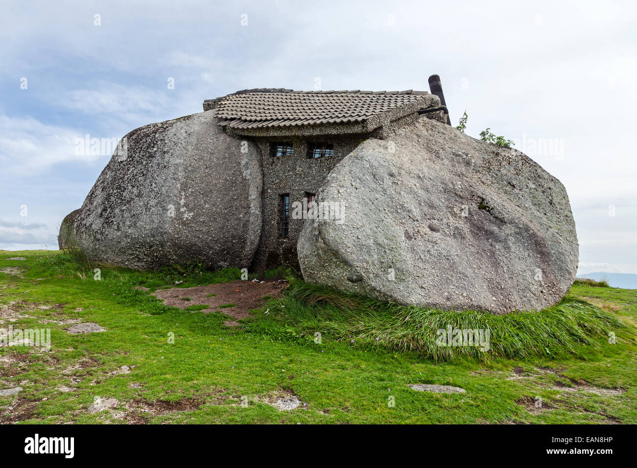 Casa do Penedo, a house built between huge rocks in Fafe, Portugal ...