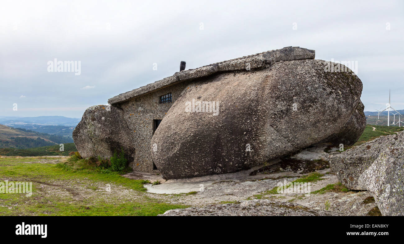 Casa do Penedo, a house built between huge rocks in Fafe, Portugal ...