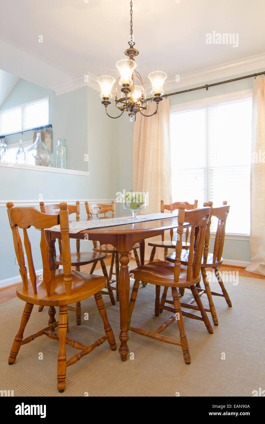 A contemporary dining room lighted by natural sunlight Stock Photo - Alamy