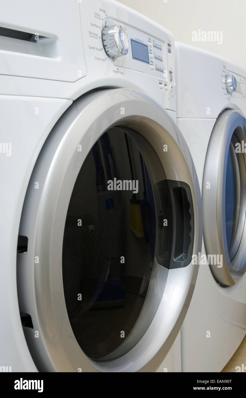 Close up view of a modern, front loading, clothes washer and dryer ...