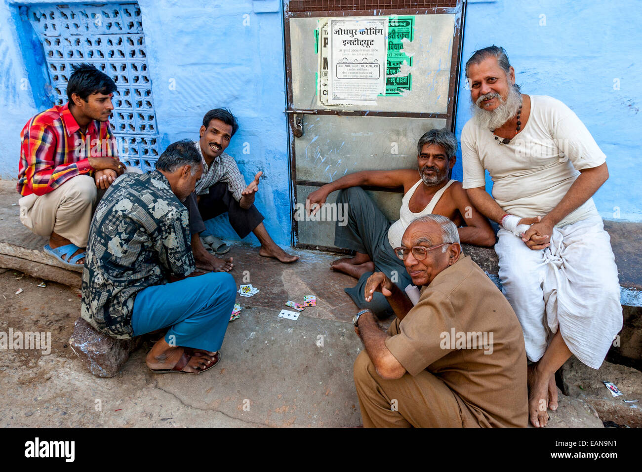 Group of indian men playing cards in street in jodhpur hi-res stock ...