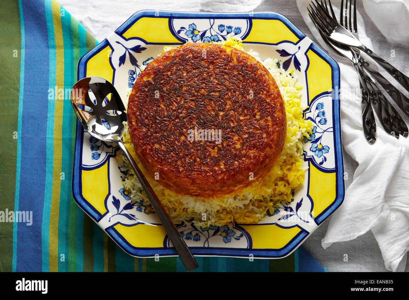 Persian saffron rice on a tiffany plate Stock Photo - Alamy