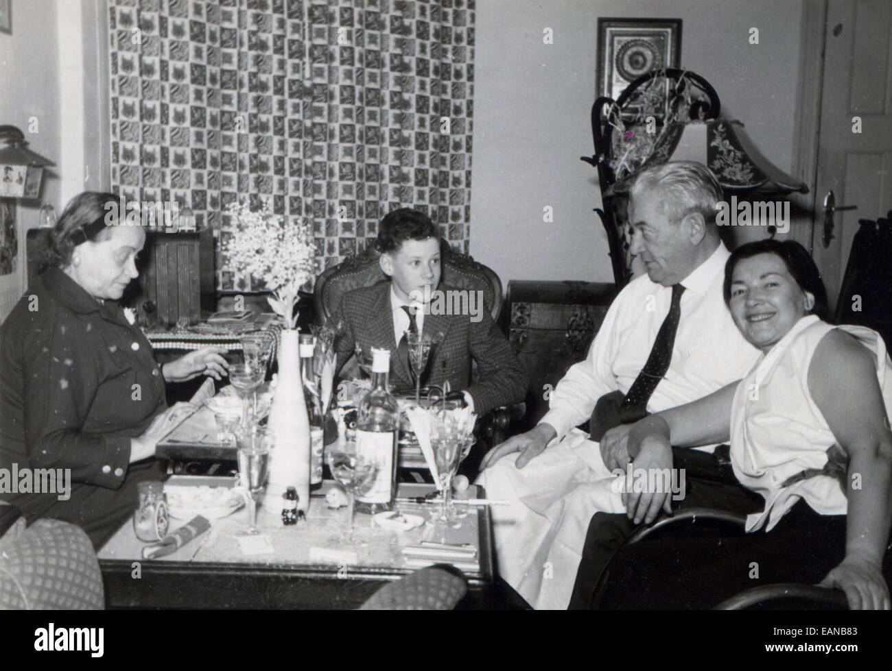Family of three generations posing for the holiday table. Germany ...