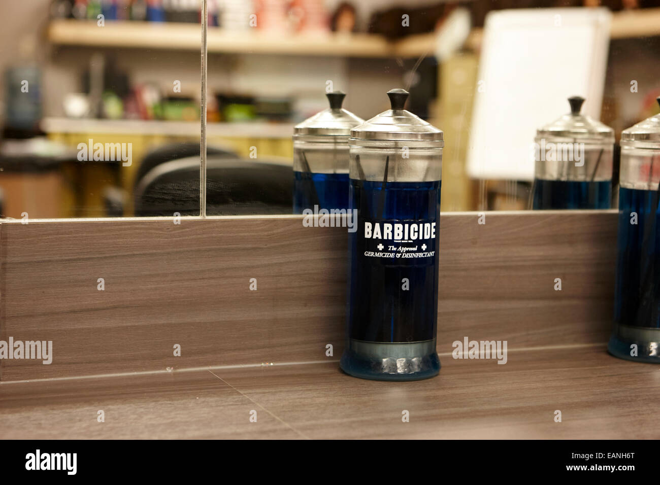 barbicide disinfectant solution in a hairdressers salon Stock Photo - Alamy