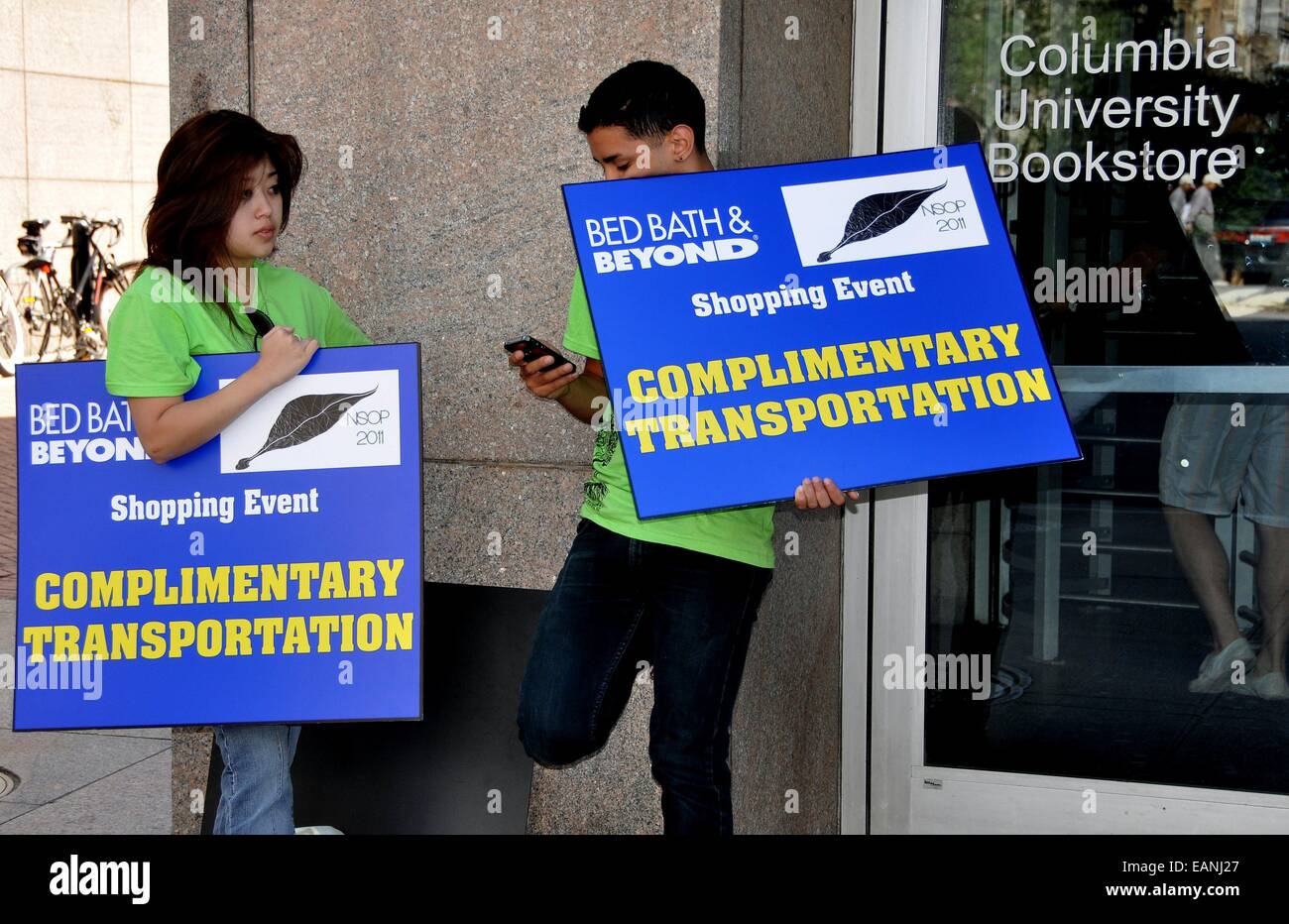 NYC: Students holding complimentary transportation advertising signs ...
