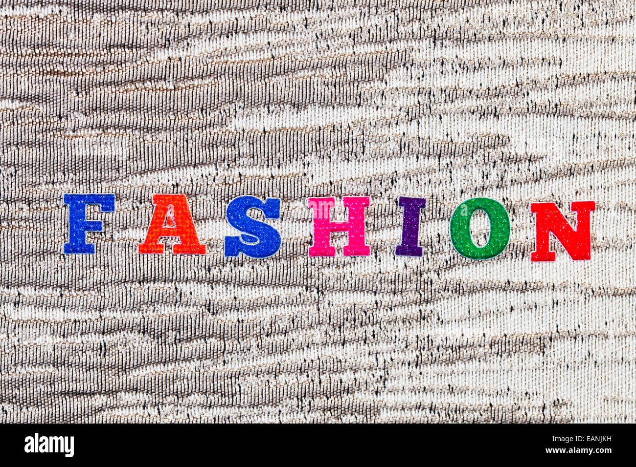 Letters spelling fashion on a textile surface Stock Photo - Alamy