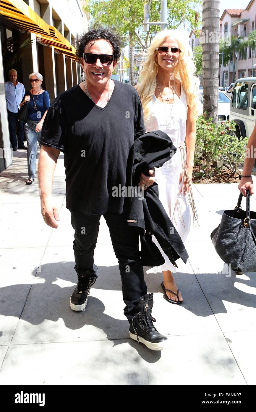 Neal Schon of Journey and wife Michaele Salahi leave Giuseppe Franco ...