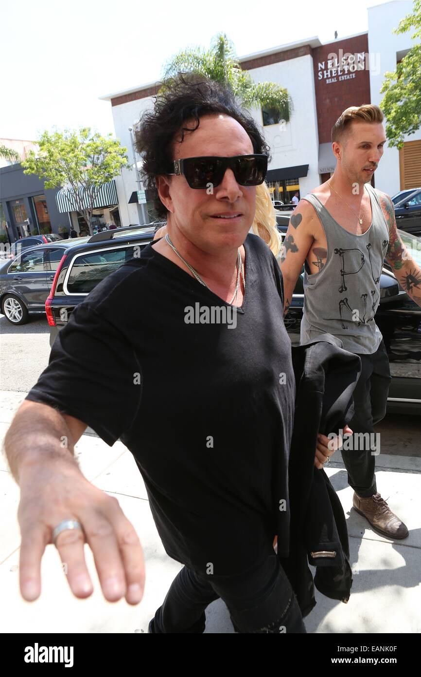 Neal Schon of Journey and wife Michaele Salahi leave Giuseppe Franco ...