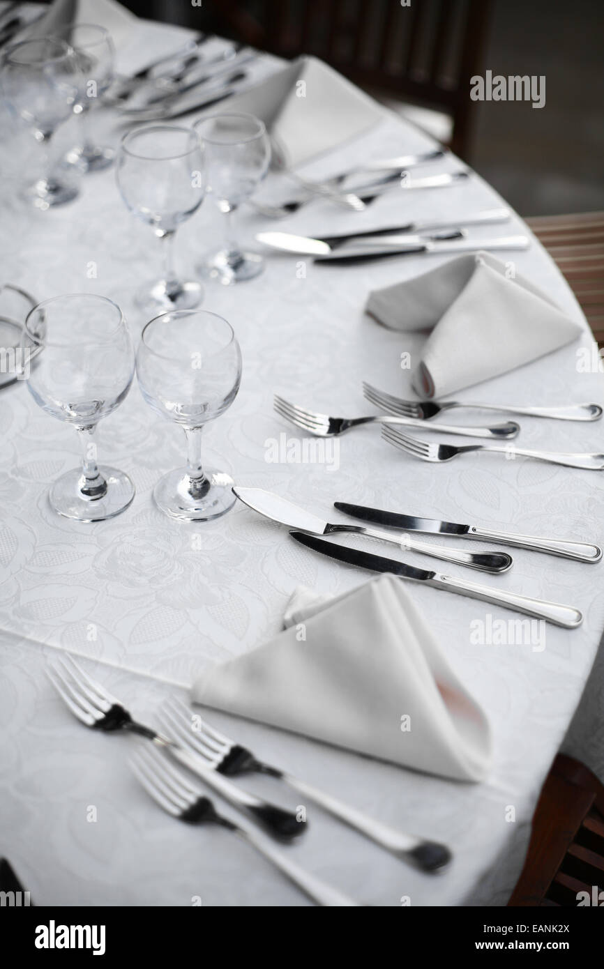 Shot with a dinner table in a restaurant Stock Photo - Alamy