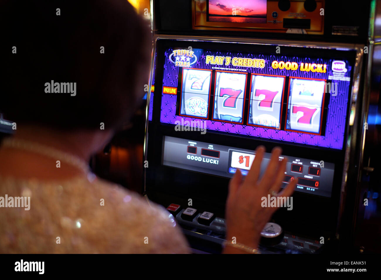 Woman gambling machine hi-res stock photography and images - Alamy