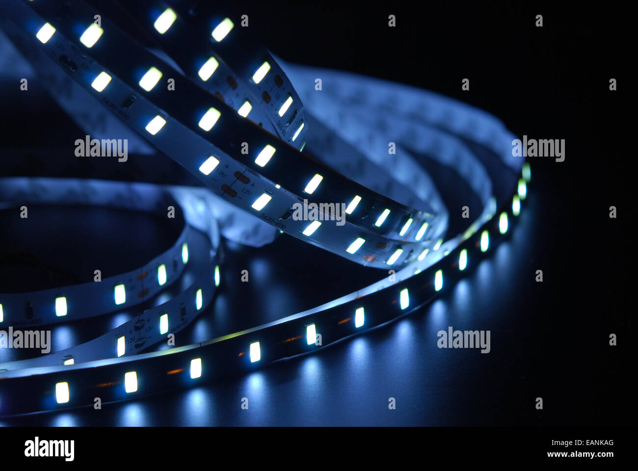 Led stripe is isolated on the black background Stock Photo - Alamy